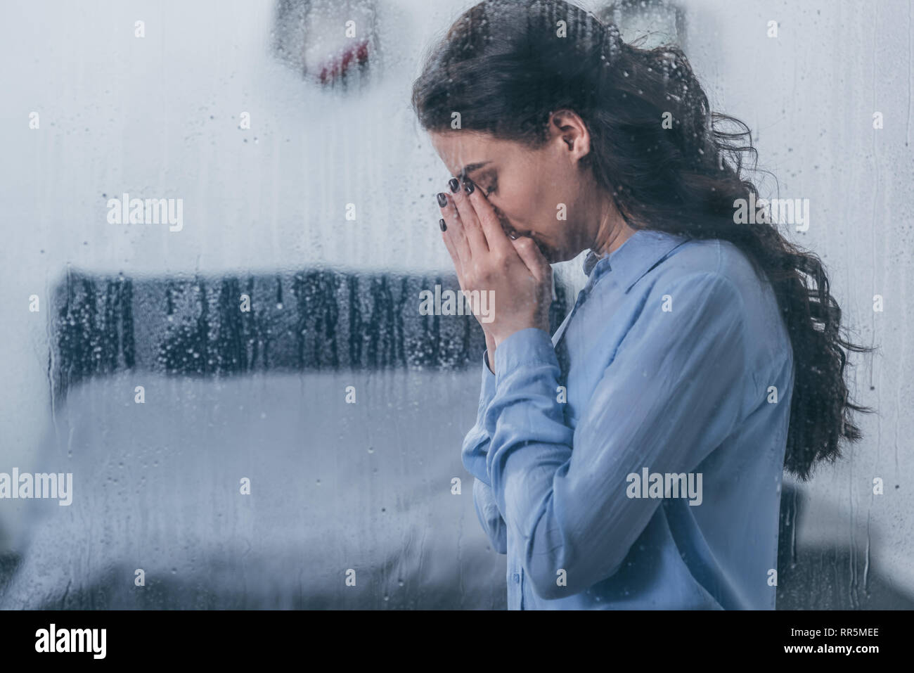A Girl Crying Alone In The Rain
