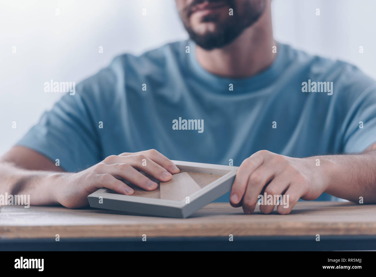 Man holding photo frame hi-res stock photography and images - Alamy