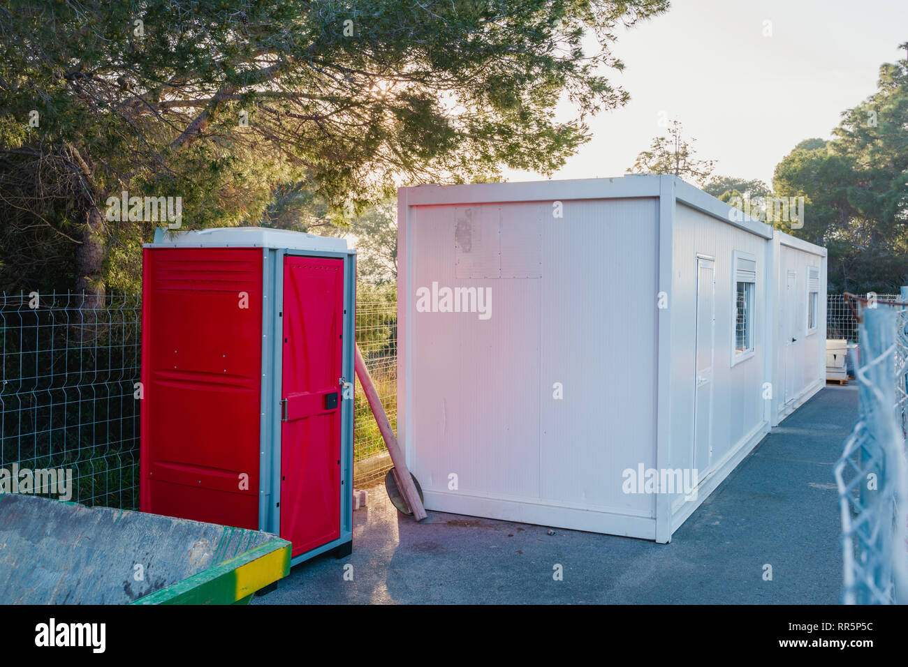 Construction Site Living Container. Outdoor portable red toilet. WC on ...