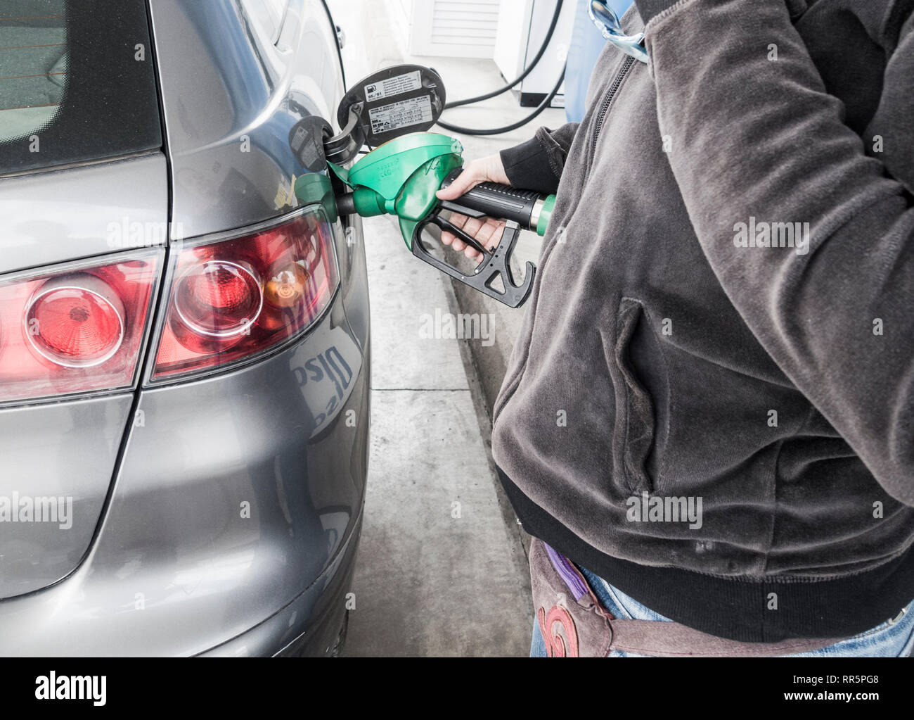 Person filling car with gas hi-res stock photography and images - Alamy