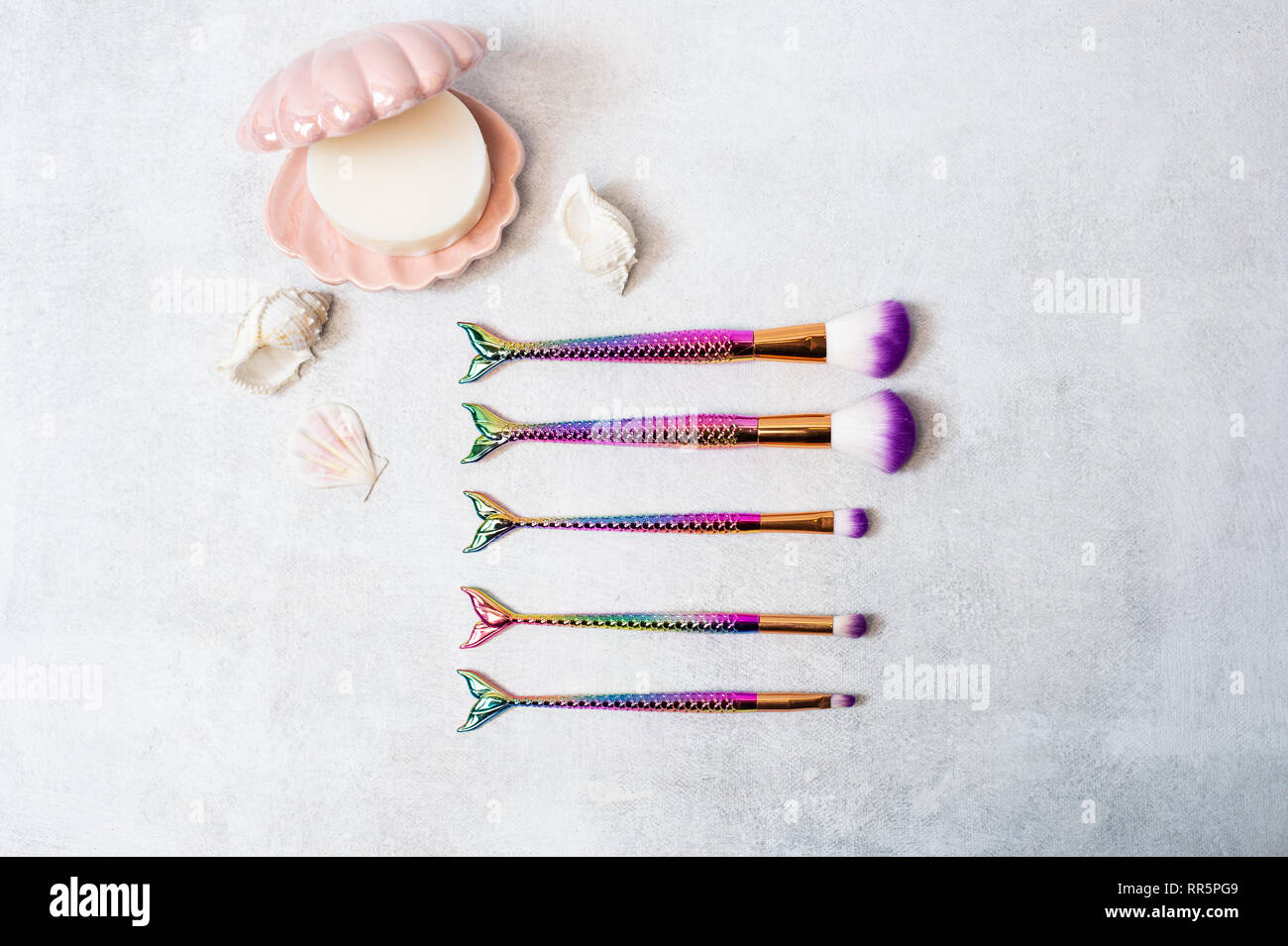 Set of mermaid tail make-up brushes. Make up tools female Stock Photo ...