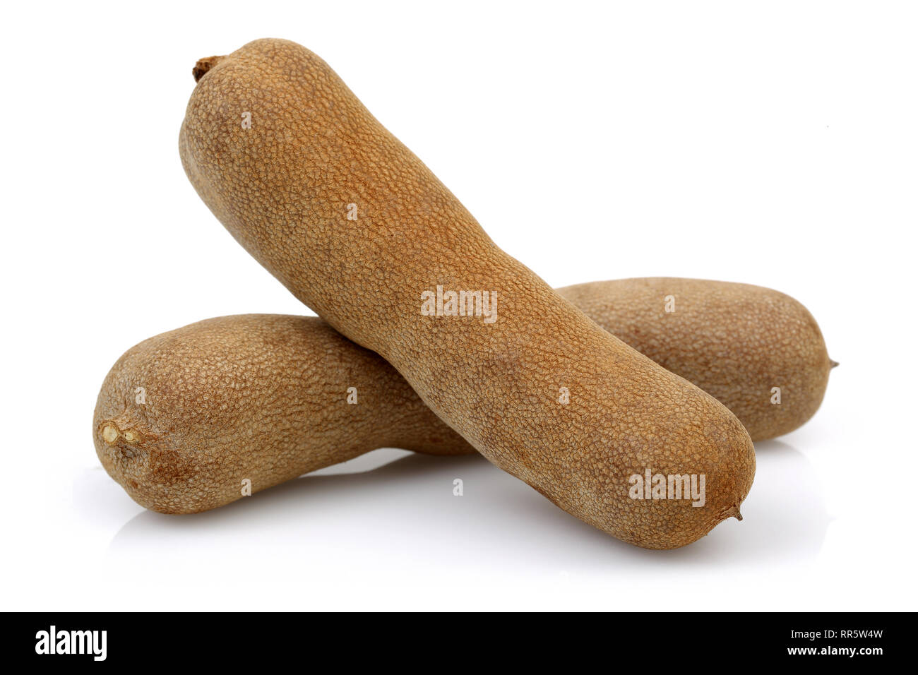 Fresh tamarind fruit isolated on white background Stock Photo - Alamy