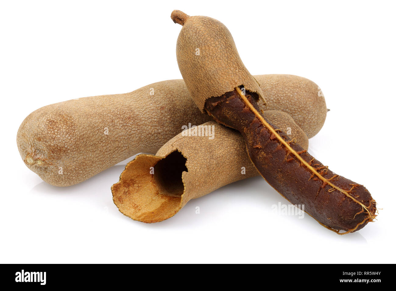 Fresh tamarind fruit isolated on white background Stock Photo - Alamy