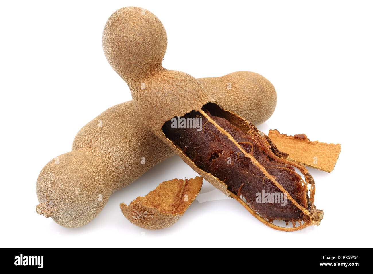 Fresh tamarind fruit isolated on white background Stock Photo - Alamy