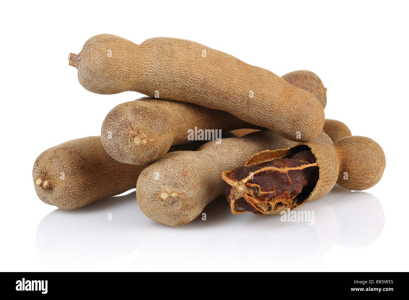 Fresh tamarind fruit isolated on white background Stock Photo - Alamy