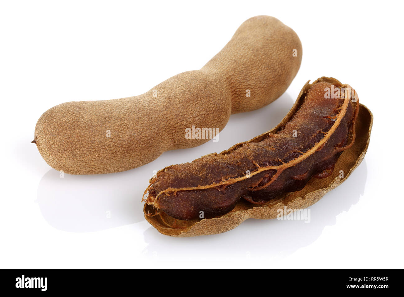 Fresh tamarind fruit isolated on white background Stock Photo - Alamy