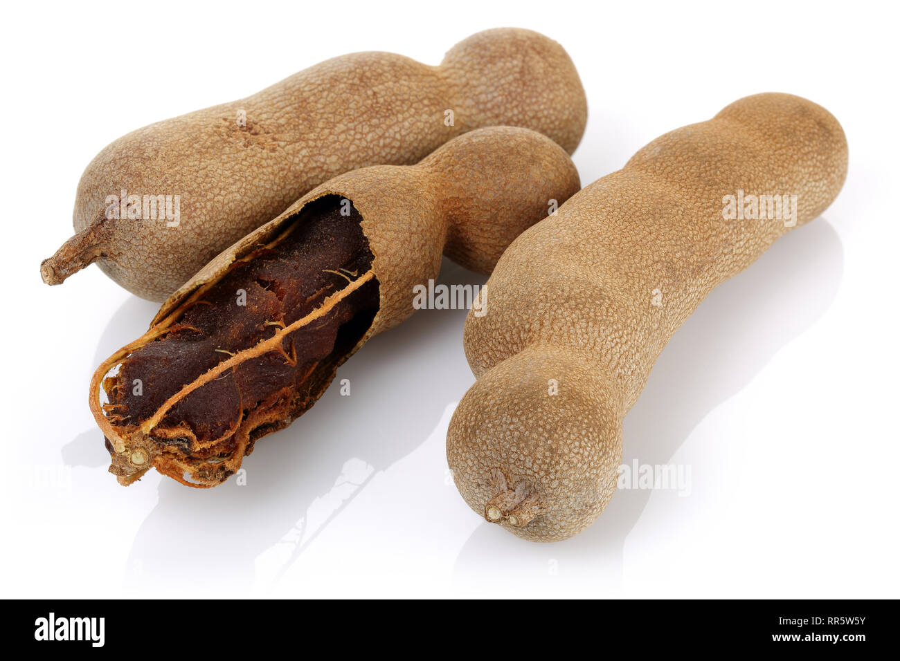 Fresh tamarind fruit isolated on white background Stock Photo - Alamy