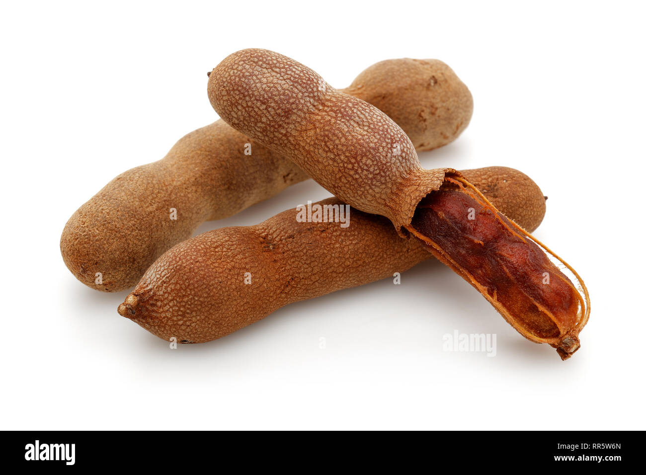 Fresh tamarind fruit isolated on white background Stock Photo - Alamy