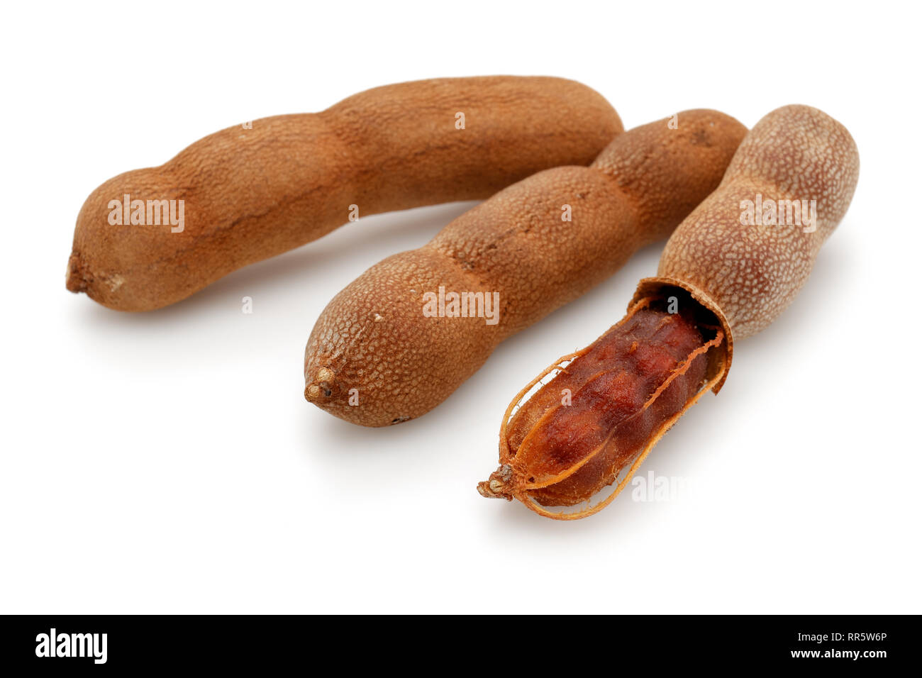 Fresh tamarind fruit isolated on white background Stock Photo - Alamy