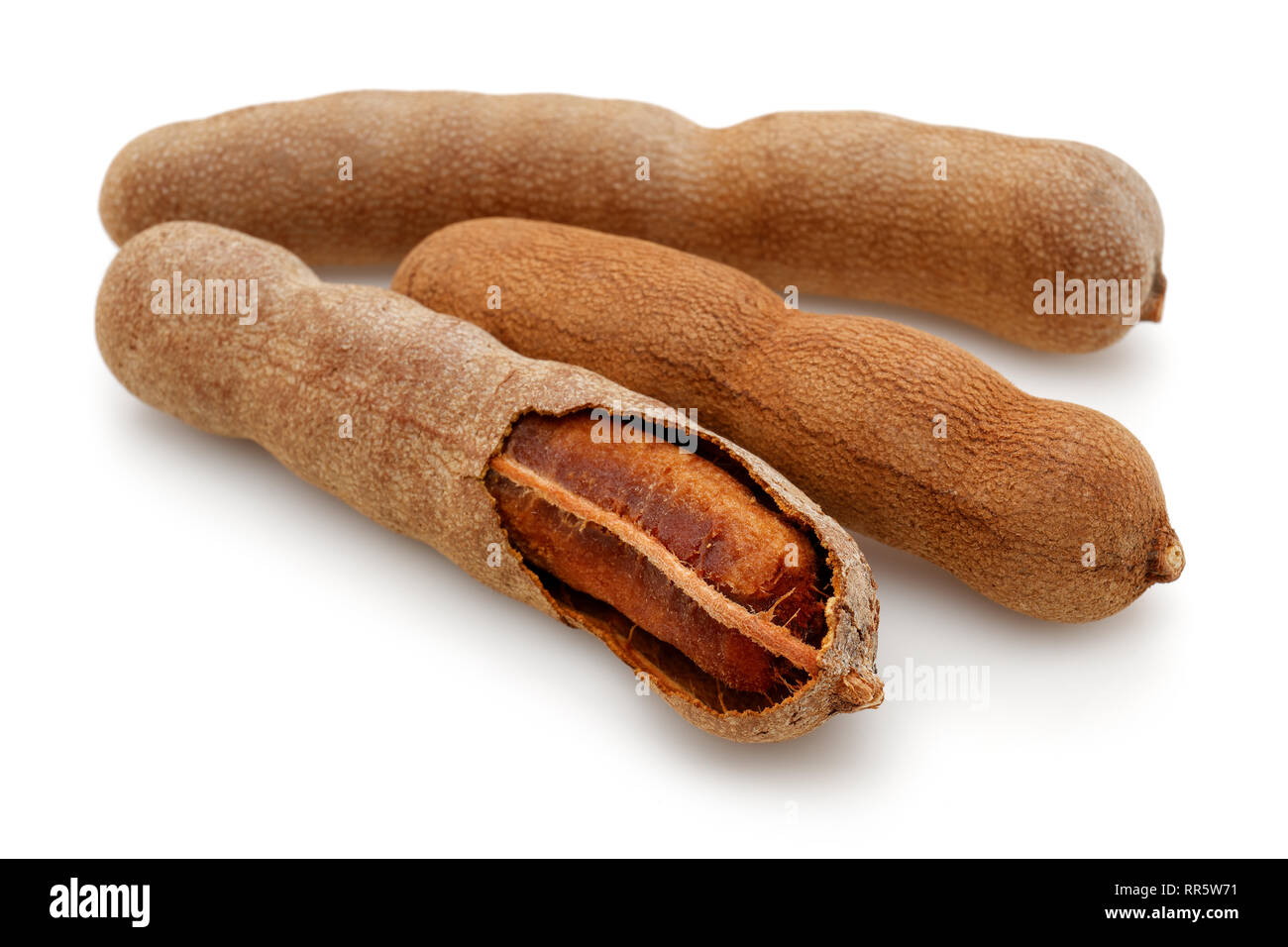Fresh tamarind fruit isolated on white background Stock Photo - Alamy