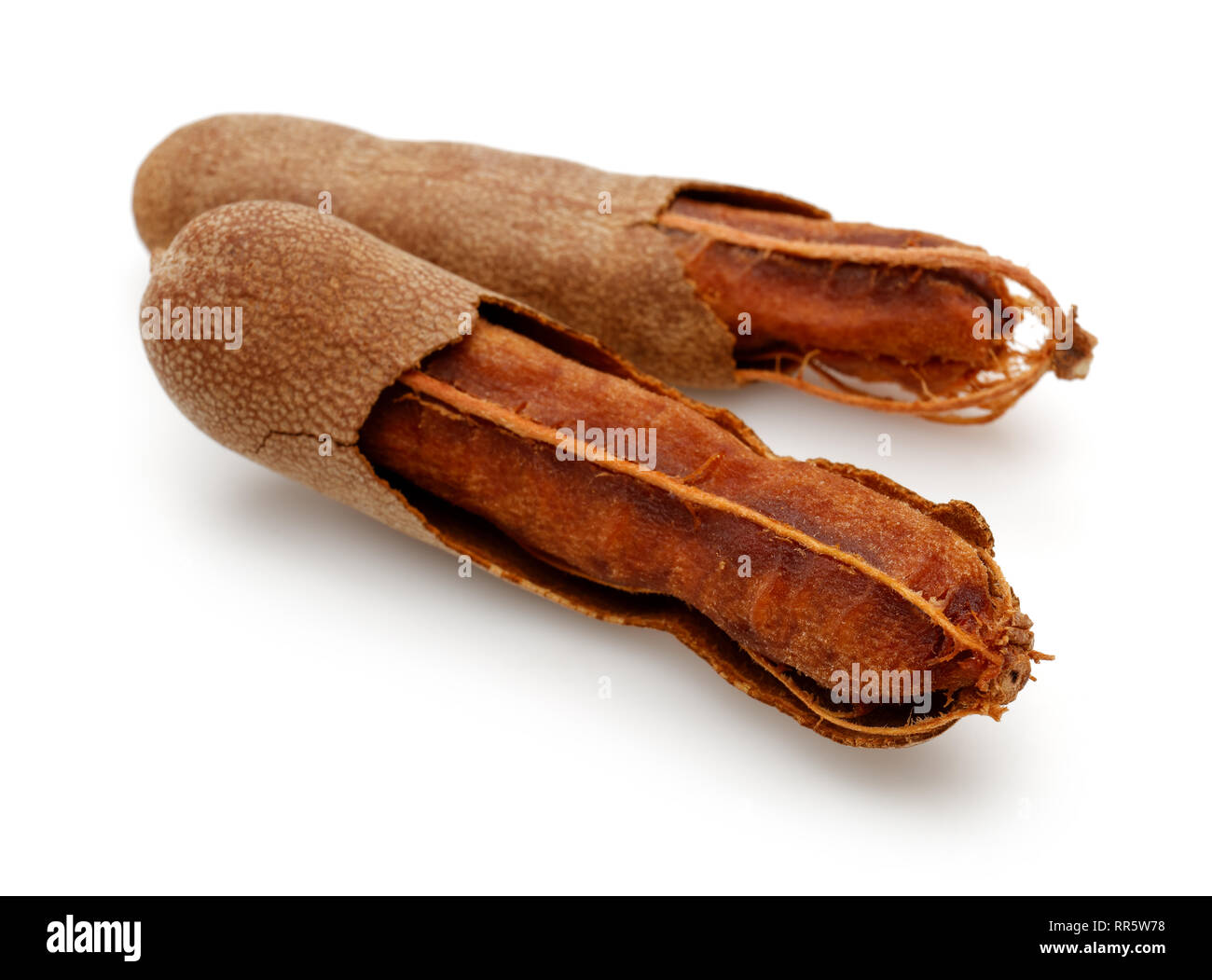 Fresh tamarind fruit isolated on white background Stock Photo - Alamy
