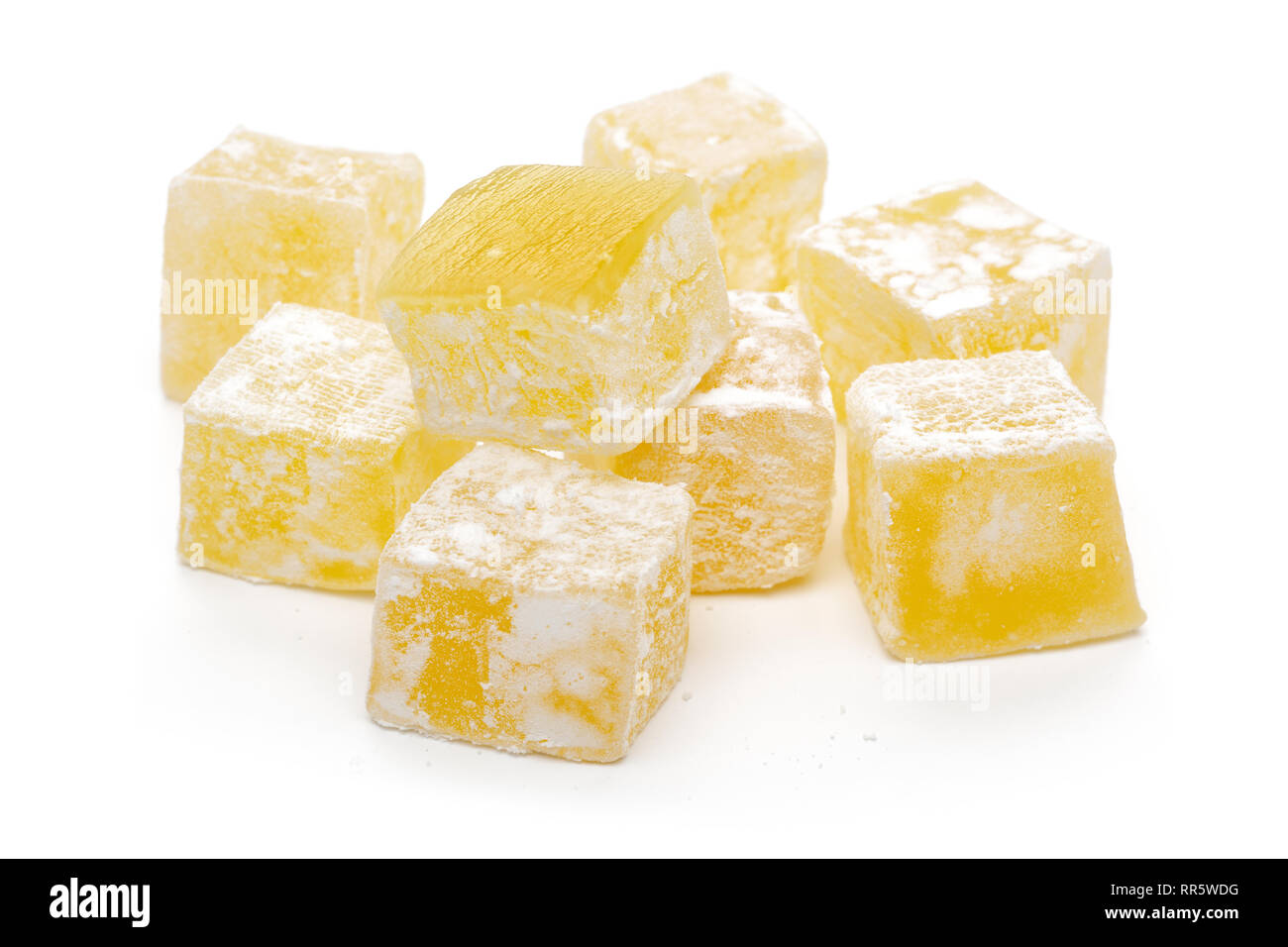 Yellow Turkish delights isolated on white background Stock Photo - Alamy