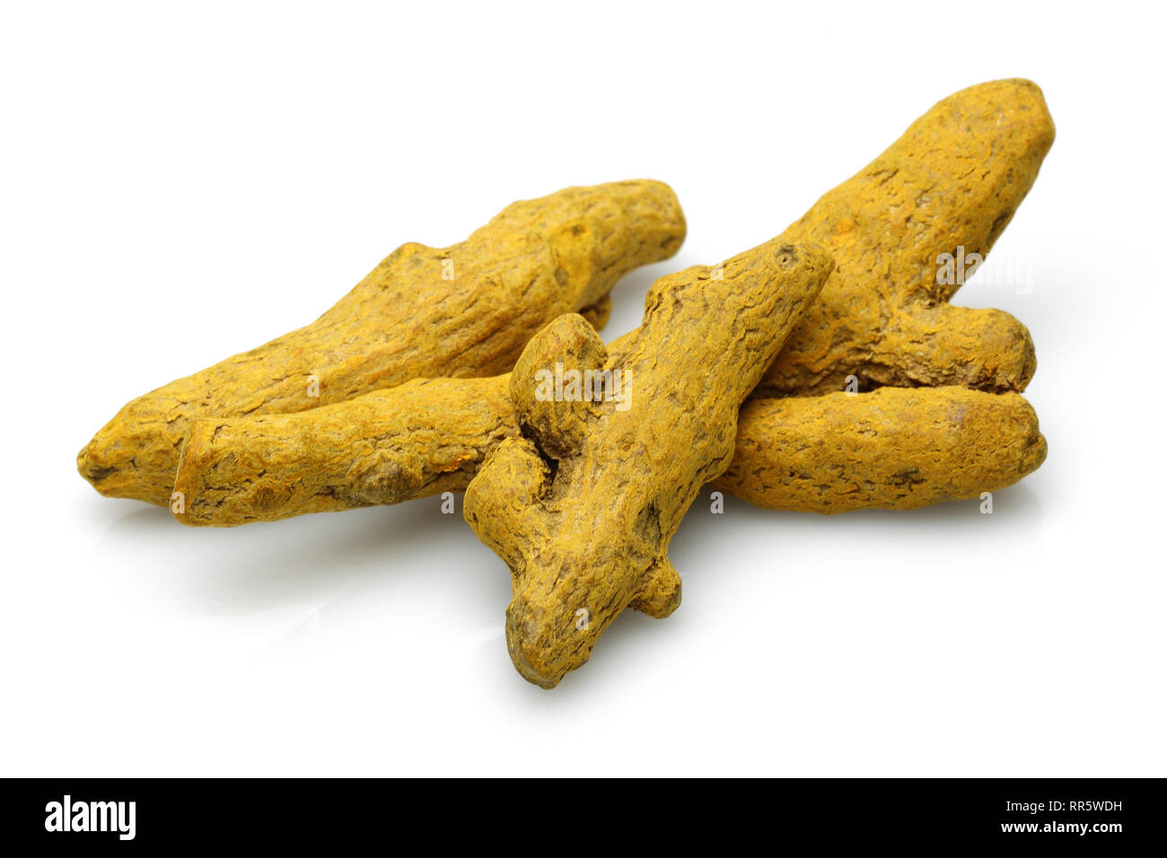 Dried turmeric isolated on white background Stock Photo - Alamy