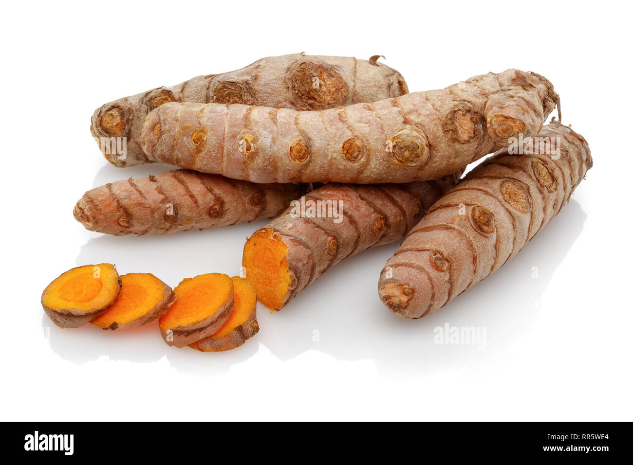 Fresh turmeric and slices isolated on white background Stock Photo - Alamy
