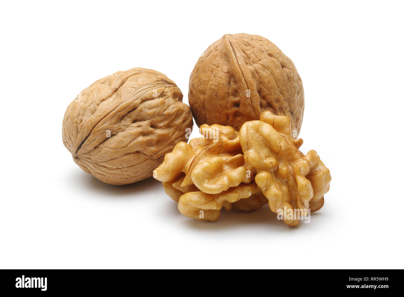 Walnuts and cracked walnut isolated on white background Stock Photo - Alamy