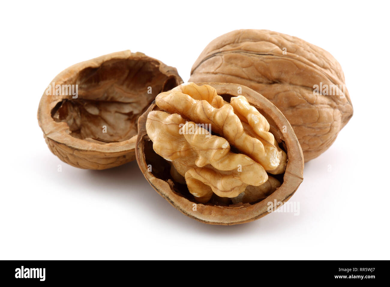 Walnuts and cracked walnut isolated on white background Stock Photo - Alamy