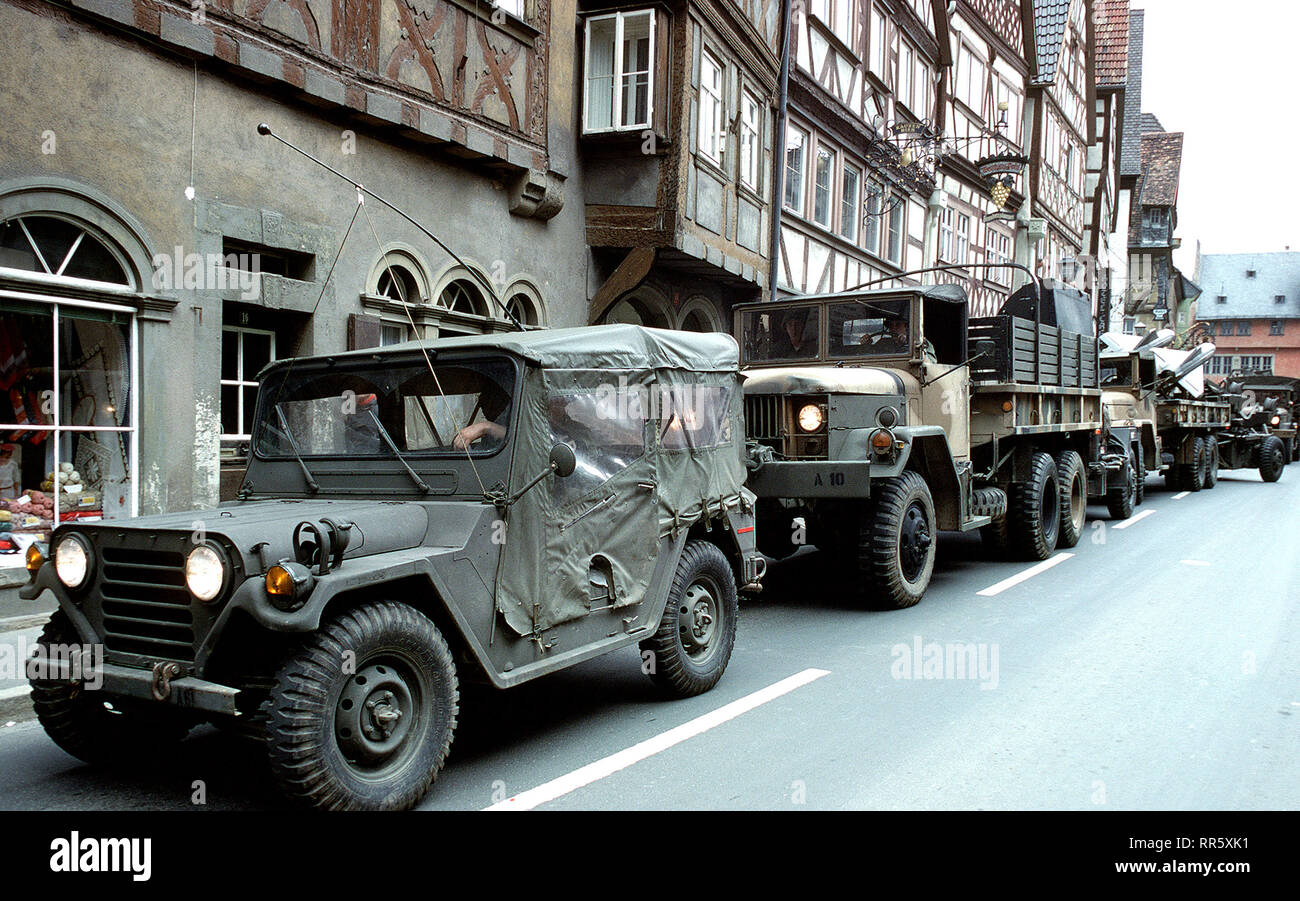 1974 - US Army convoy passes through a European town Stock Photo - Alamy