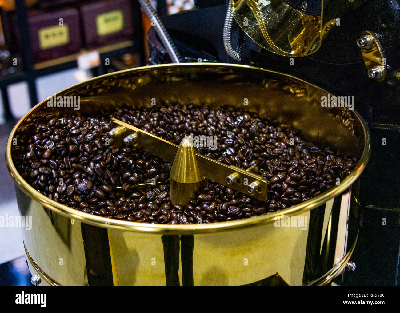 Roasted coffee in coffee roaster, arabica roasted coffee crop Stock ...