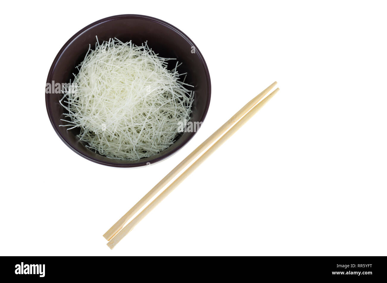 Thin dry rice noodles for cooking Asian dishes. Studio Photo Stock ...