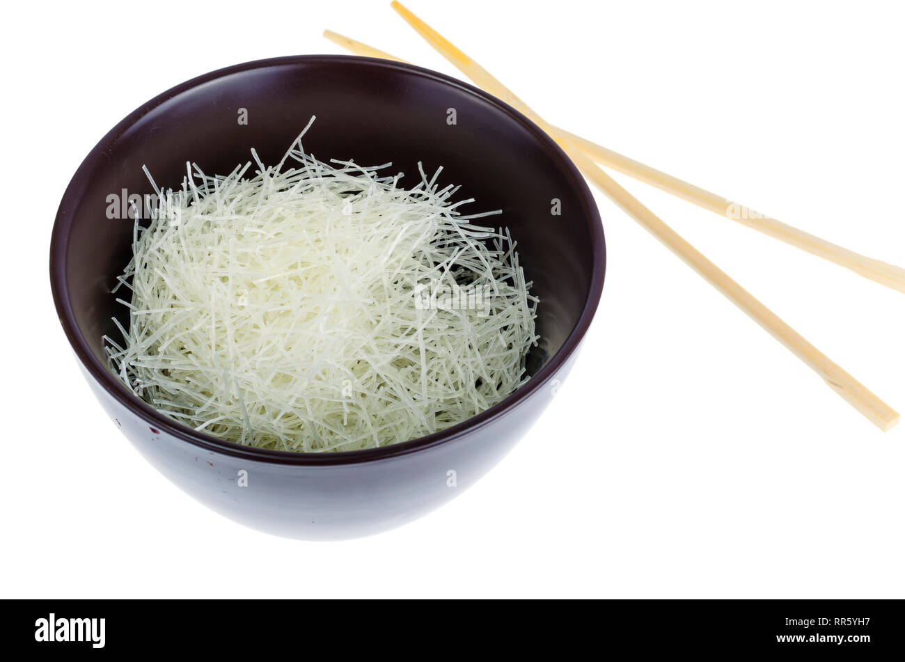 Thin dry rice noodles for cooking Asian dishes. Studio Photo Stock ...
