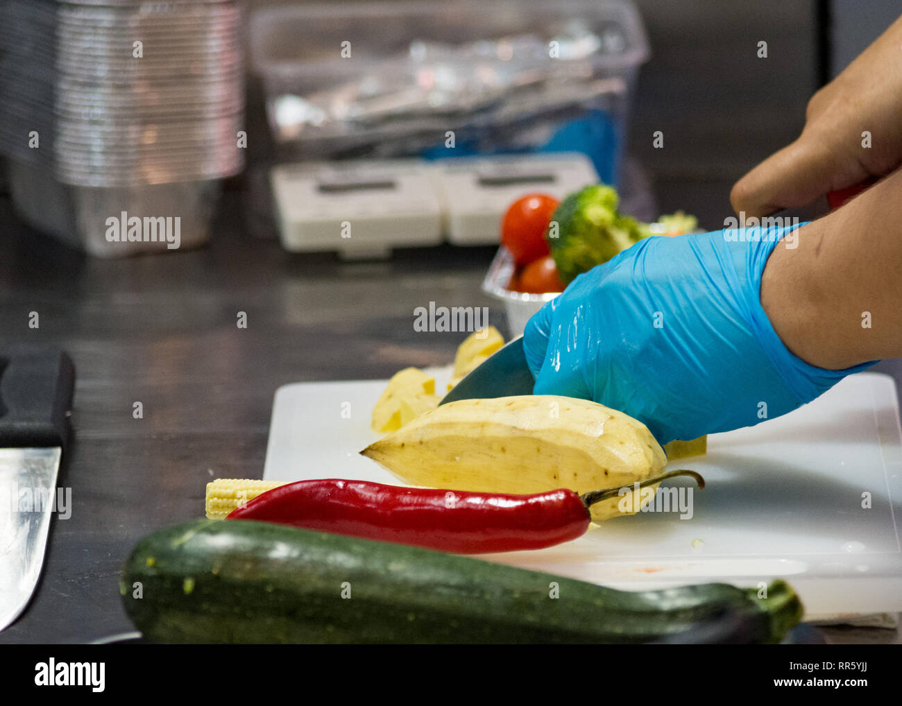 Chef cooking food, vegetables in the kitchen Stock Photo - Alamy