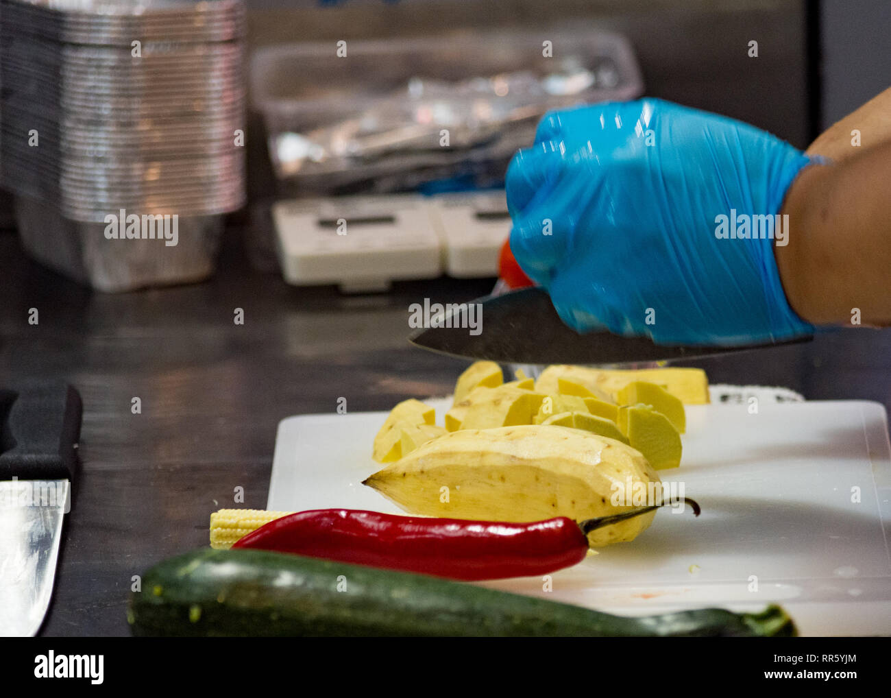 Chef cooking food, vegetables in the kitchen Stock Photo - Alamy