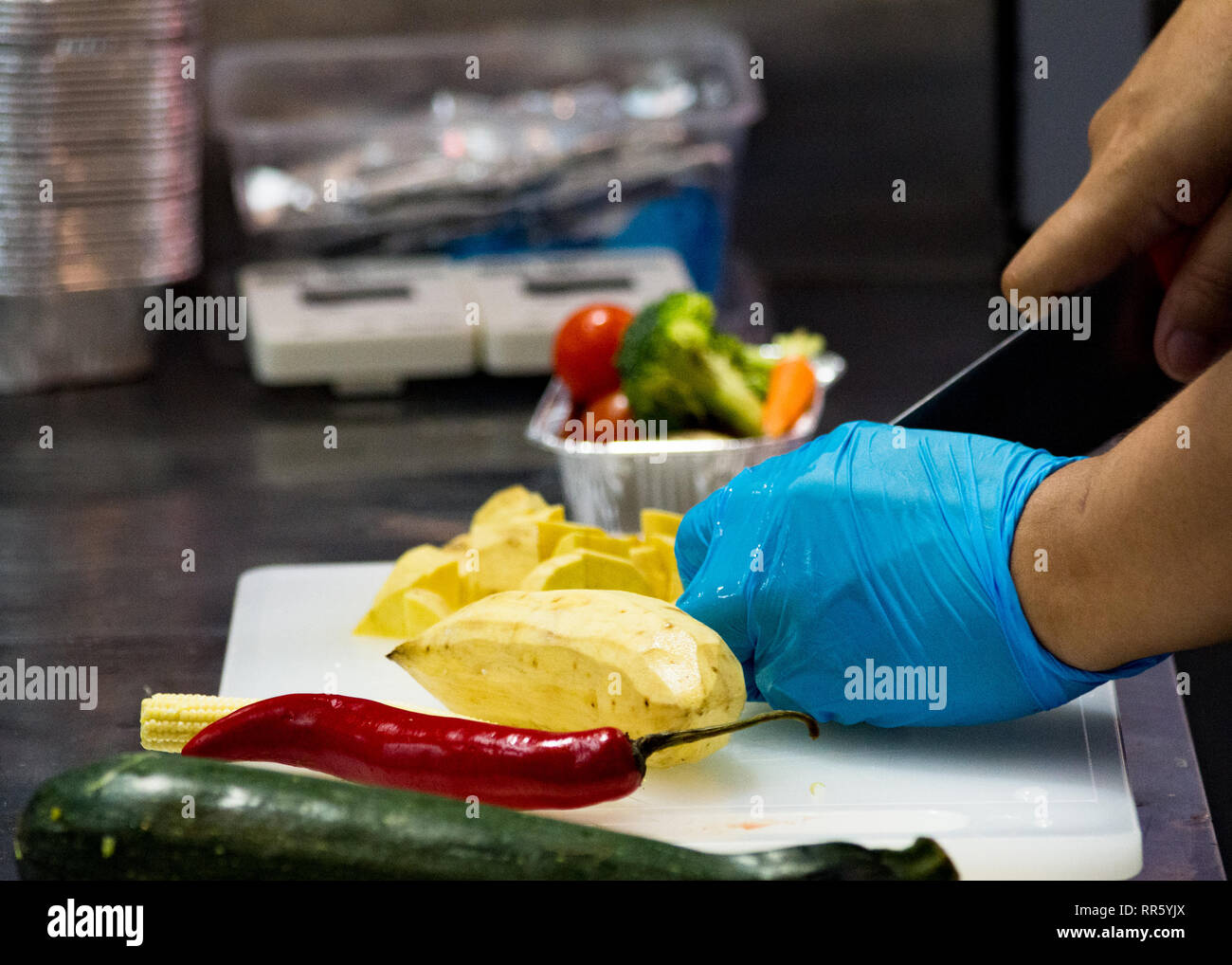 Chef cooking food, vegetables in the kitchen Stock Photo - Alamy