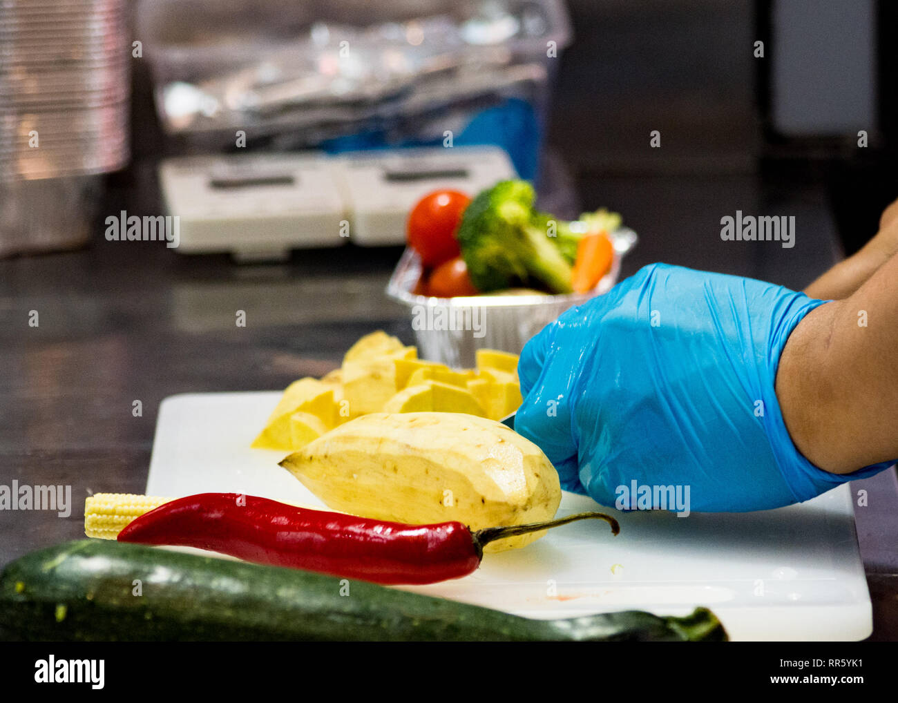 Chef cooking food, vegetables in the kitchen Stock Photo - Alamy