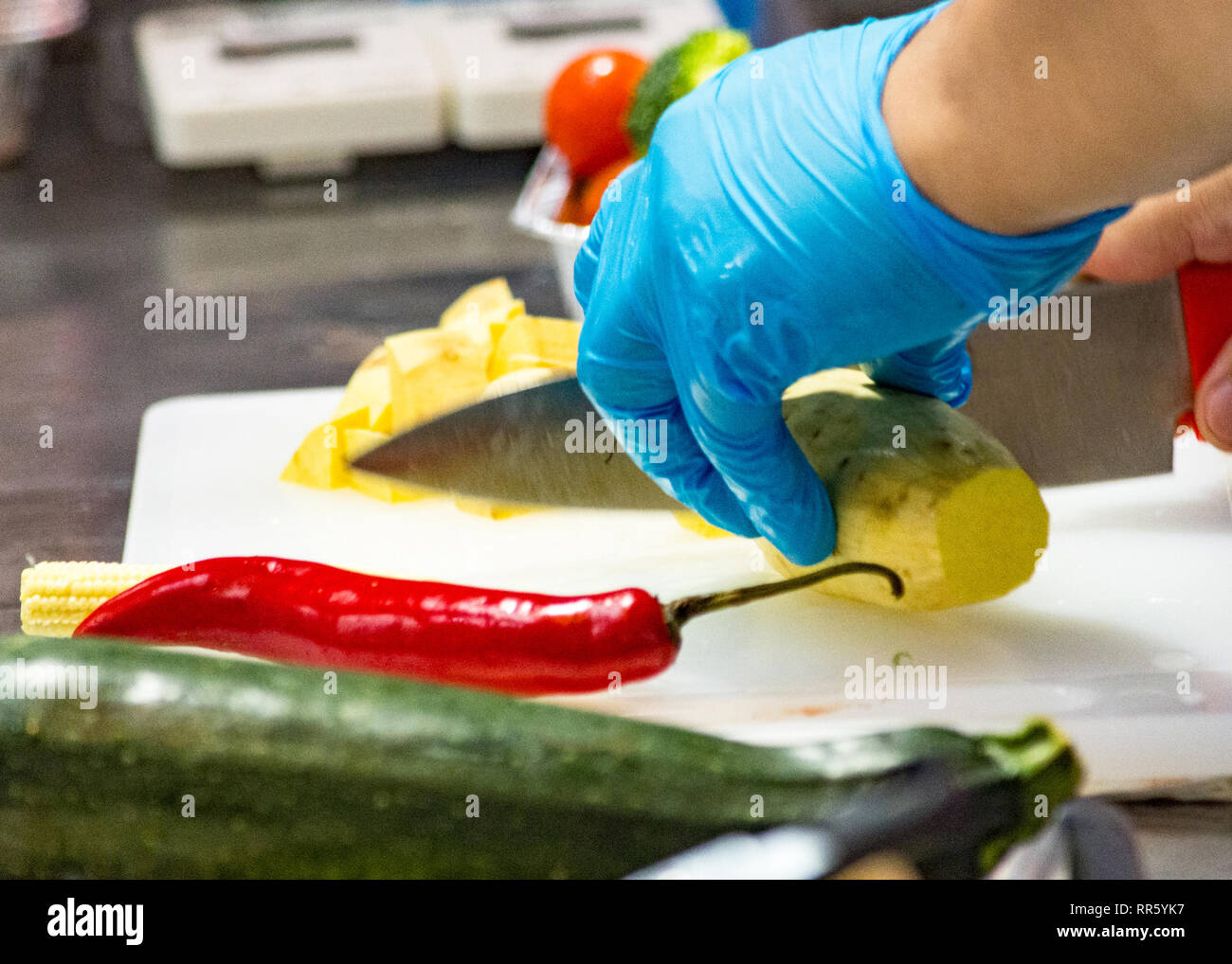 Chef cooking food, vegetables in the kitchen Stock Photo - Alamy