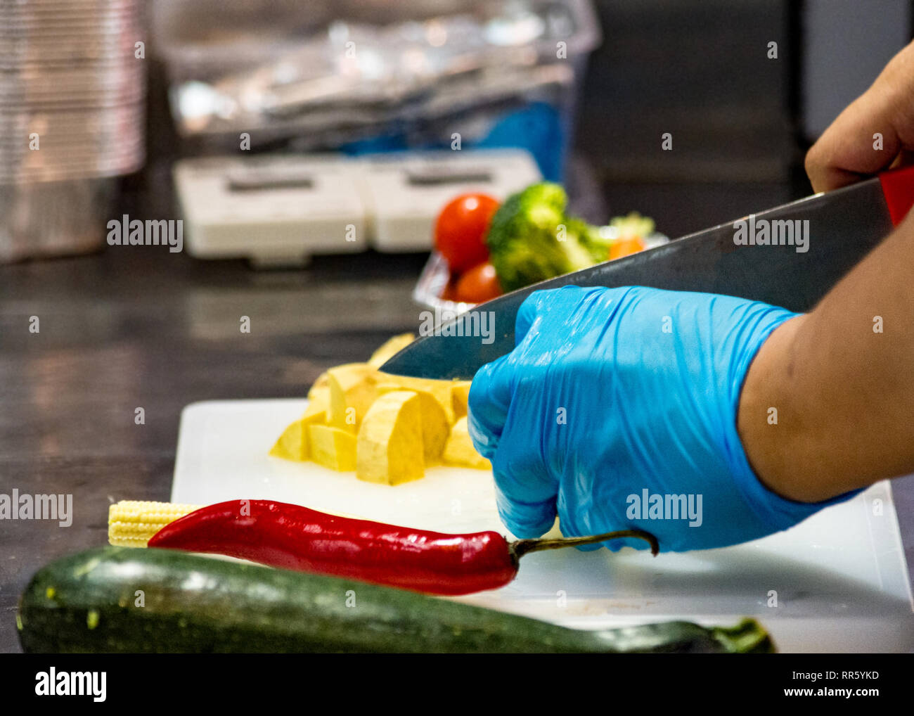 Chef cooking food, vegetables in the kitchen Stock Photo - Alamy
