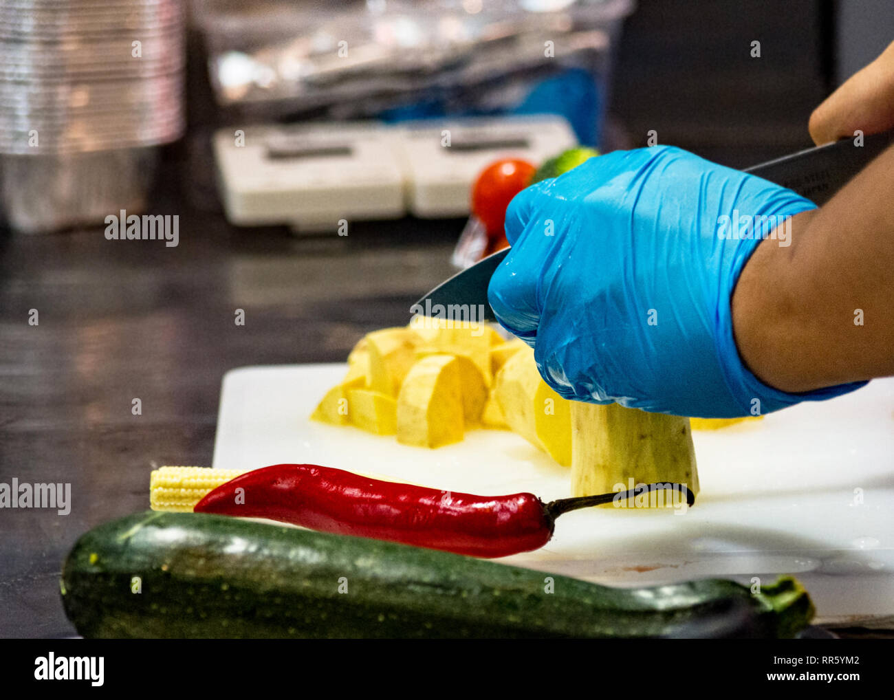 Chef cooking food, vegetables in the kitchen Stock Photo - Alamy