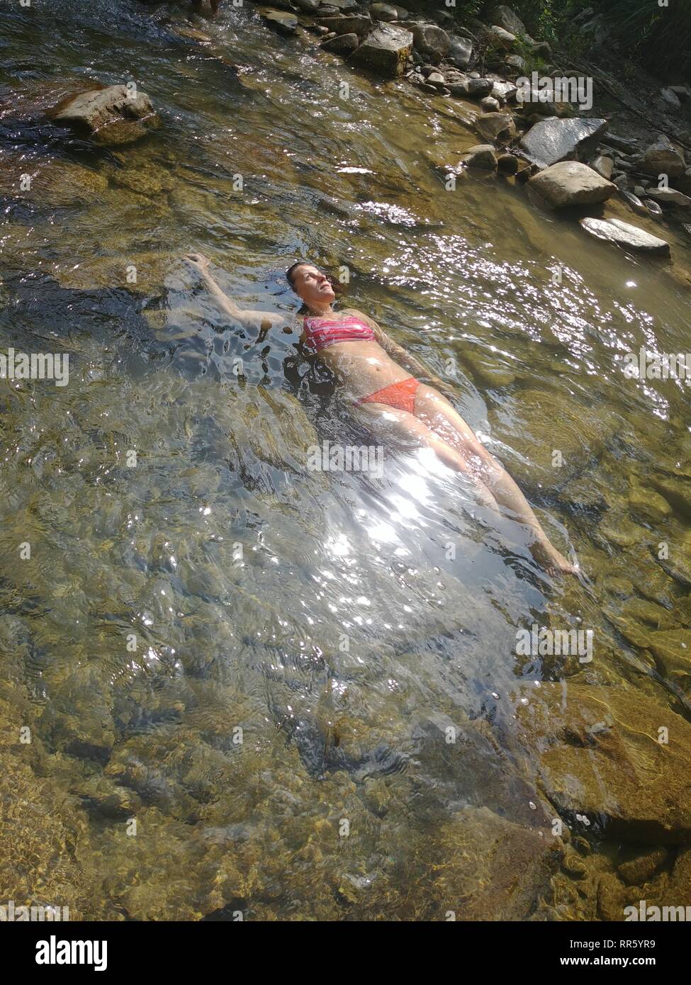 girl in the river Stock Photo - Alamy