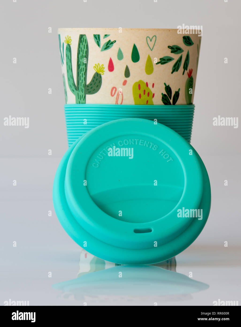 Reusable coffee cup made from natural material with silicone sleeve and ...