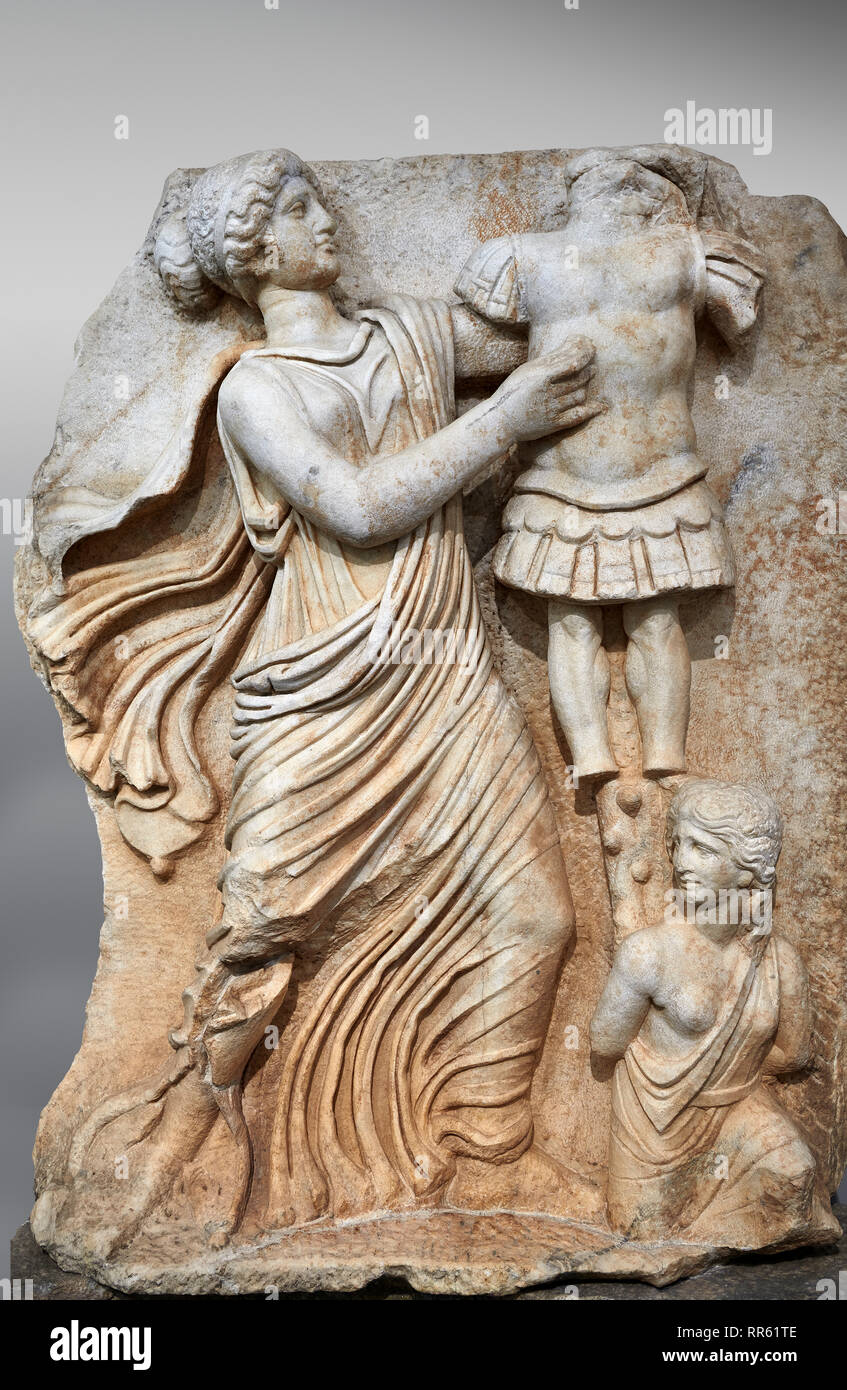 Roman Sebasteion relief sculpture of a Goddess inscribing a trophy ...