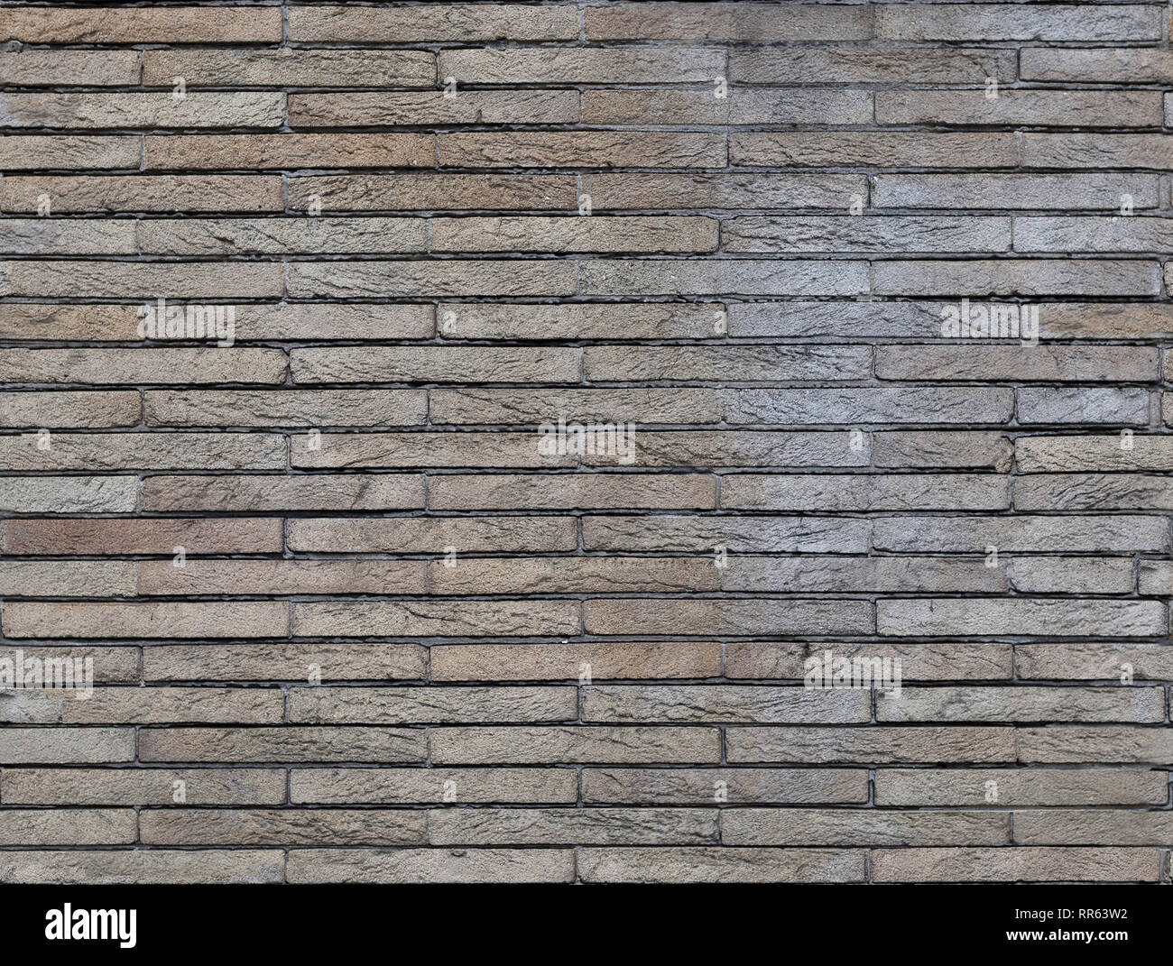 A fragment of the walls of the house are covered with ceramic tiles ...