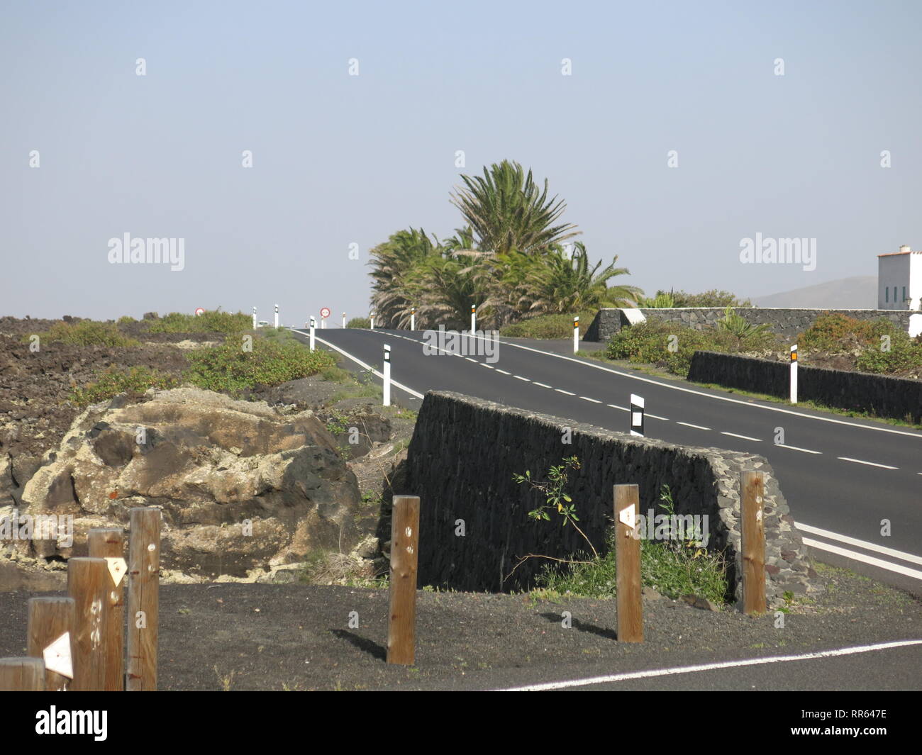 Modern tarmacked roads wind through the bleak and rugged volcanic ...