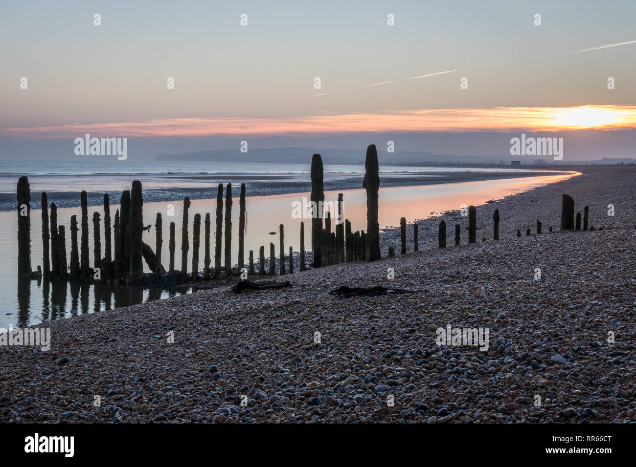 Groynes ocean orange hi-res stock photography and images - Alamy