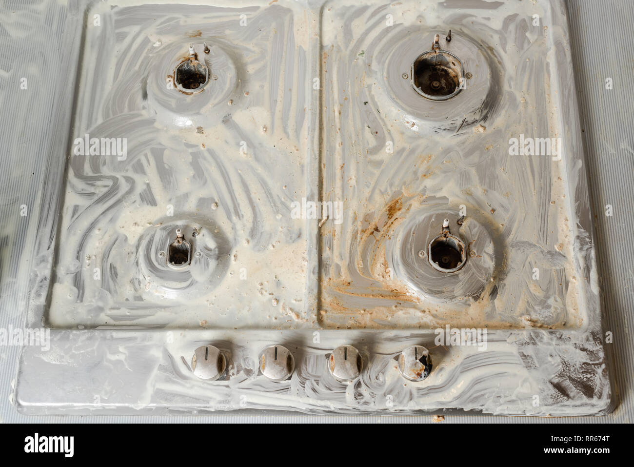 Detergent soap on untidy cooker. Wash with soap kitchen cooking ...