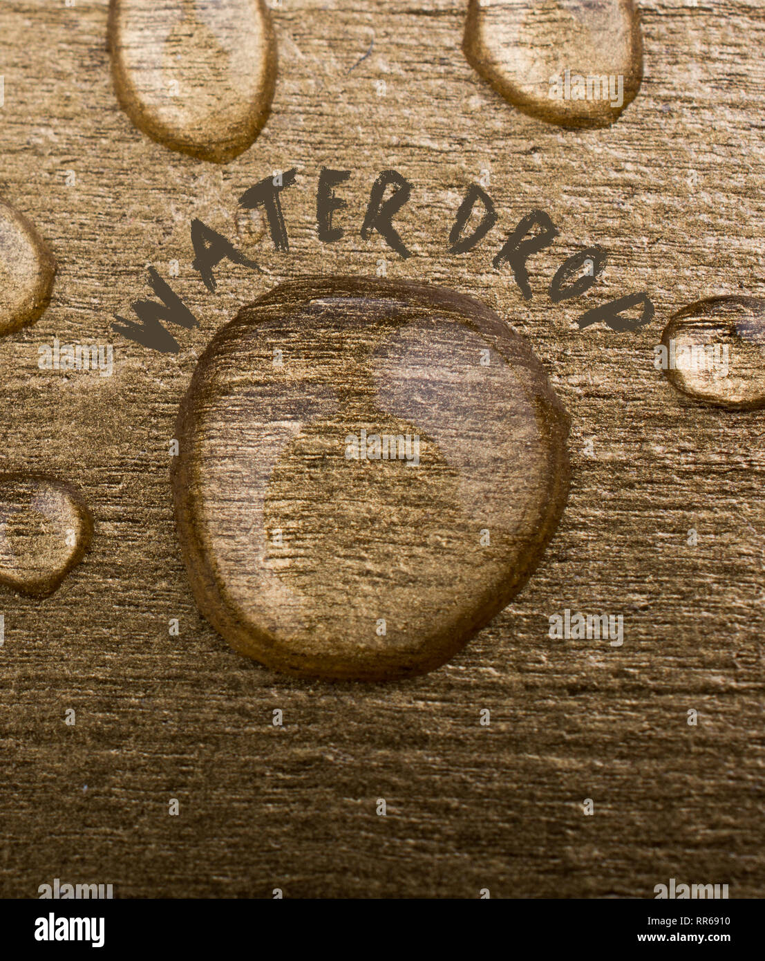 Water drop text and water drops on wooden surface Stock Photo - Alamy