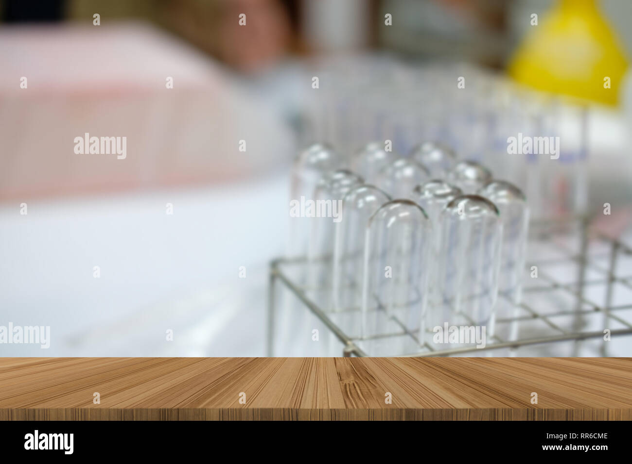 glass tubein scientific lab. chemistry laboratory glassware with wood ...