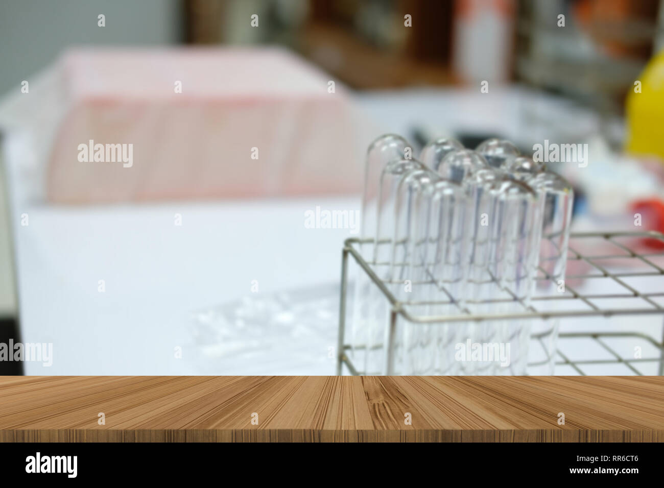 glass tubein scientific lab. chemistry laboratory glassware with wood ...