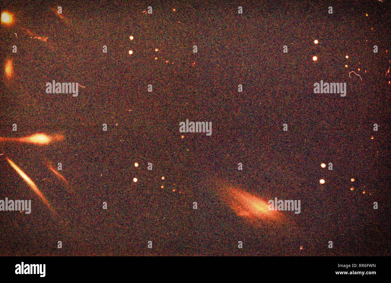 Abstract film texture background with heavy grain, dust and light leaks ...