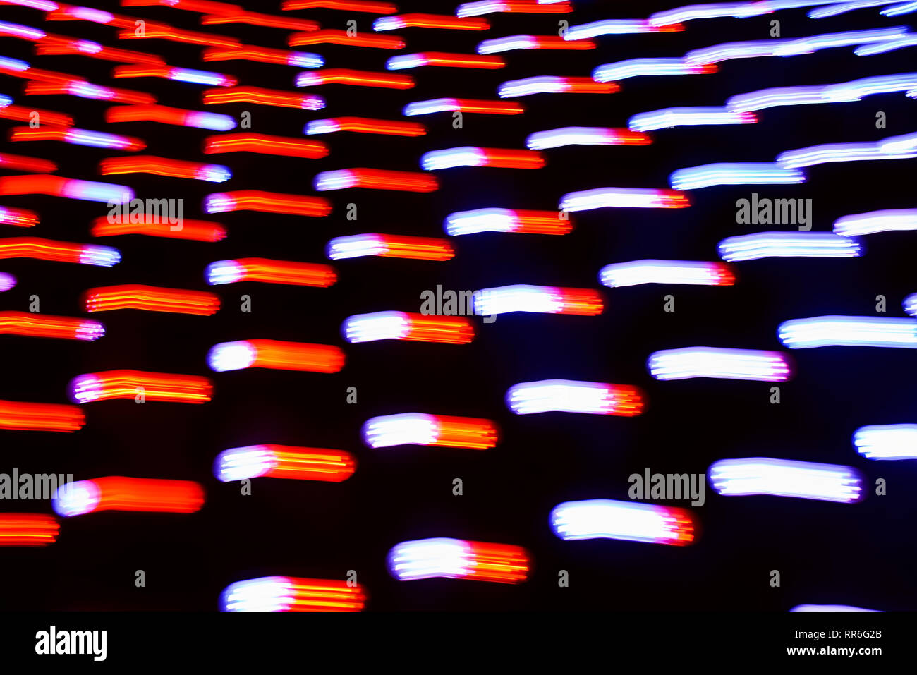 Long exposure photo of moving colorful neon light patterns Stock Photo ...