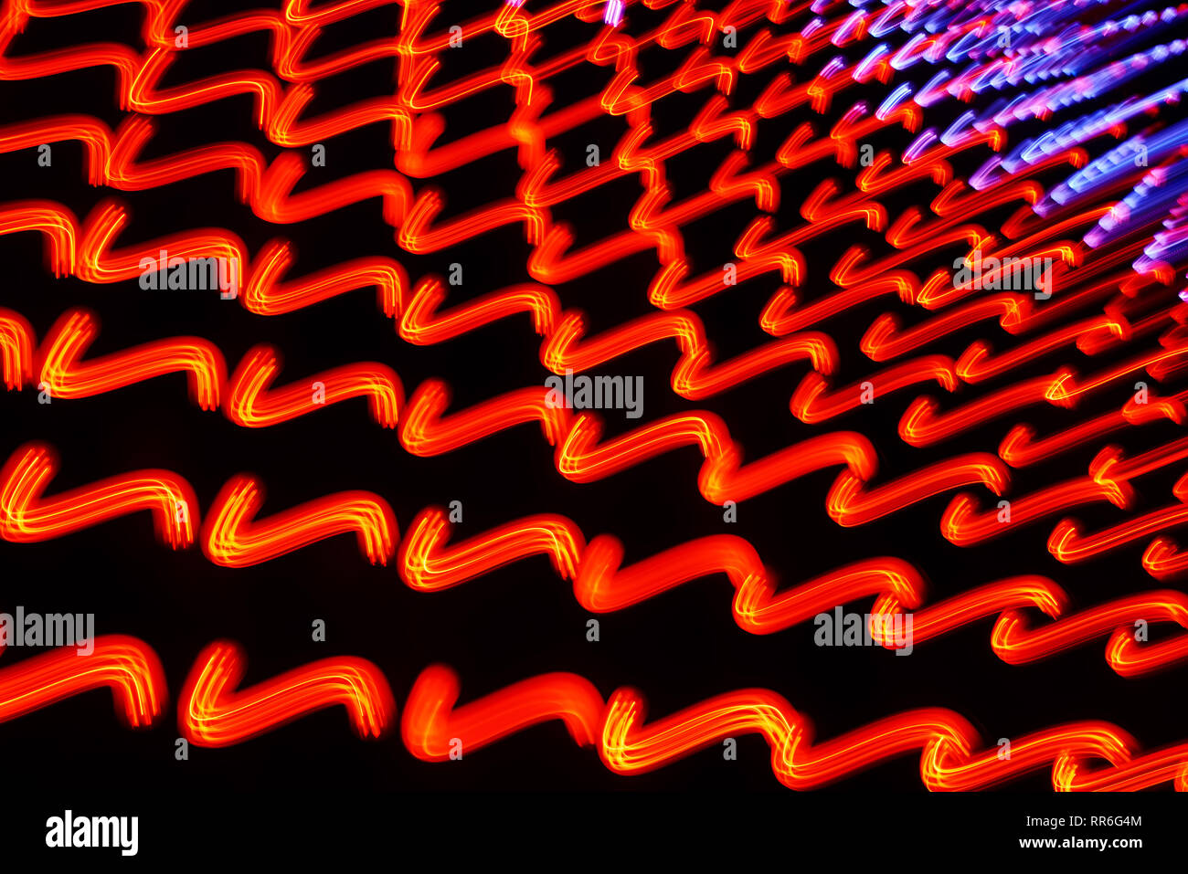 Long exposure photo of moving colorful neon light patterns Stock Photo ...