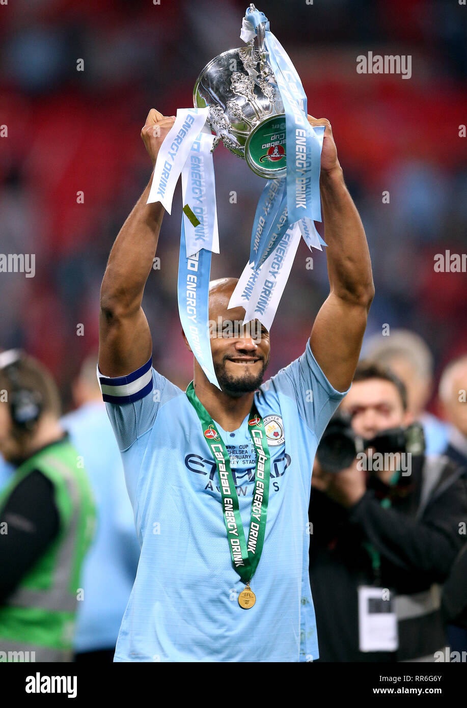 Manchester City Captain Vincent Kompany lifts the trophy after his team ...