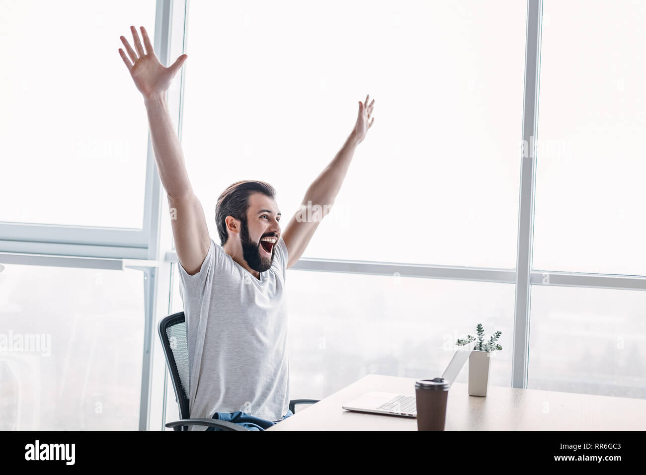 Raises arms hi-res stock photography and images - Alamy
