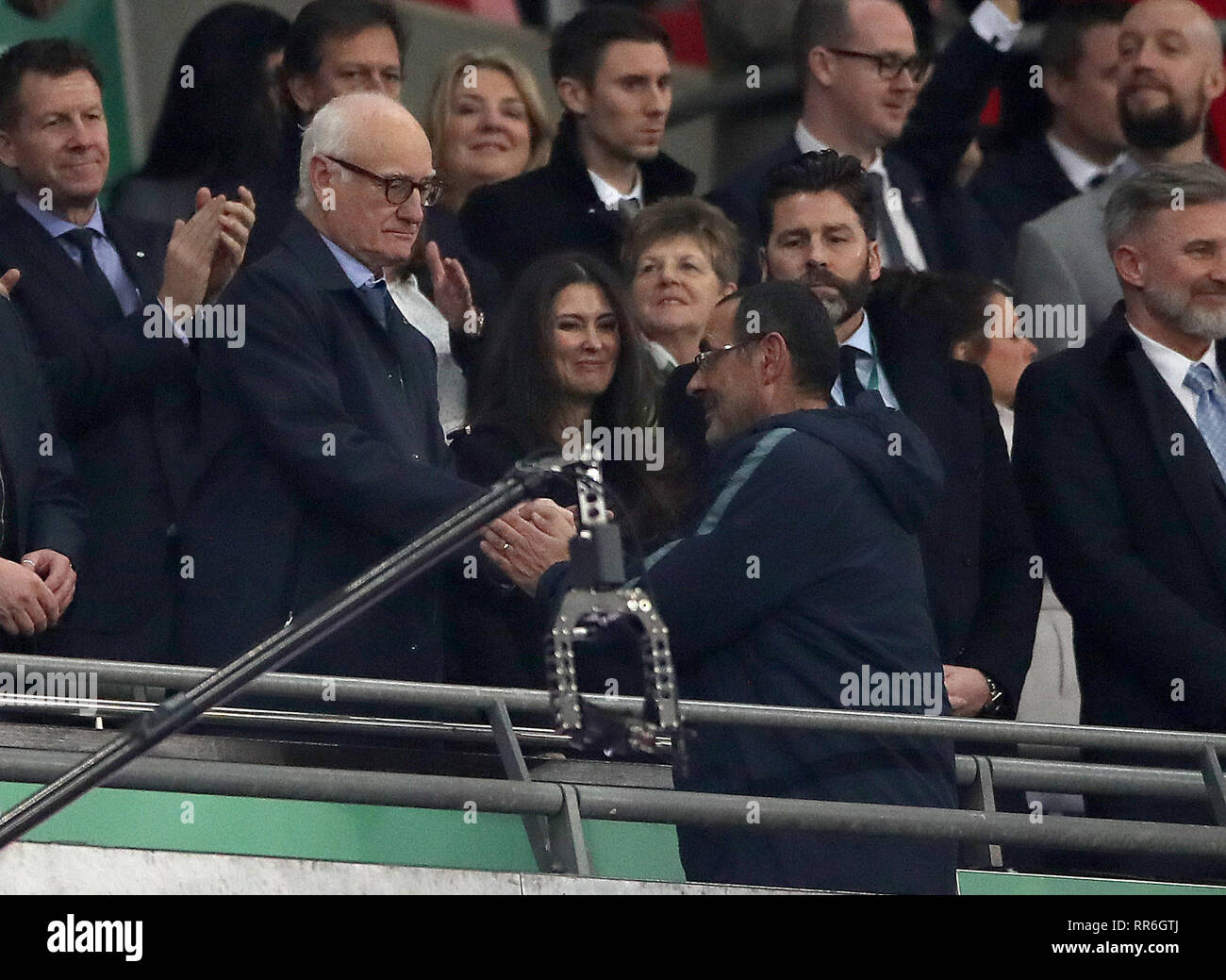 Chelse chairman Bruce Buck (left) shakes hands with manager Maurizio ...