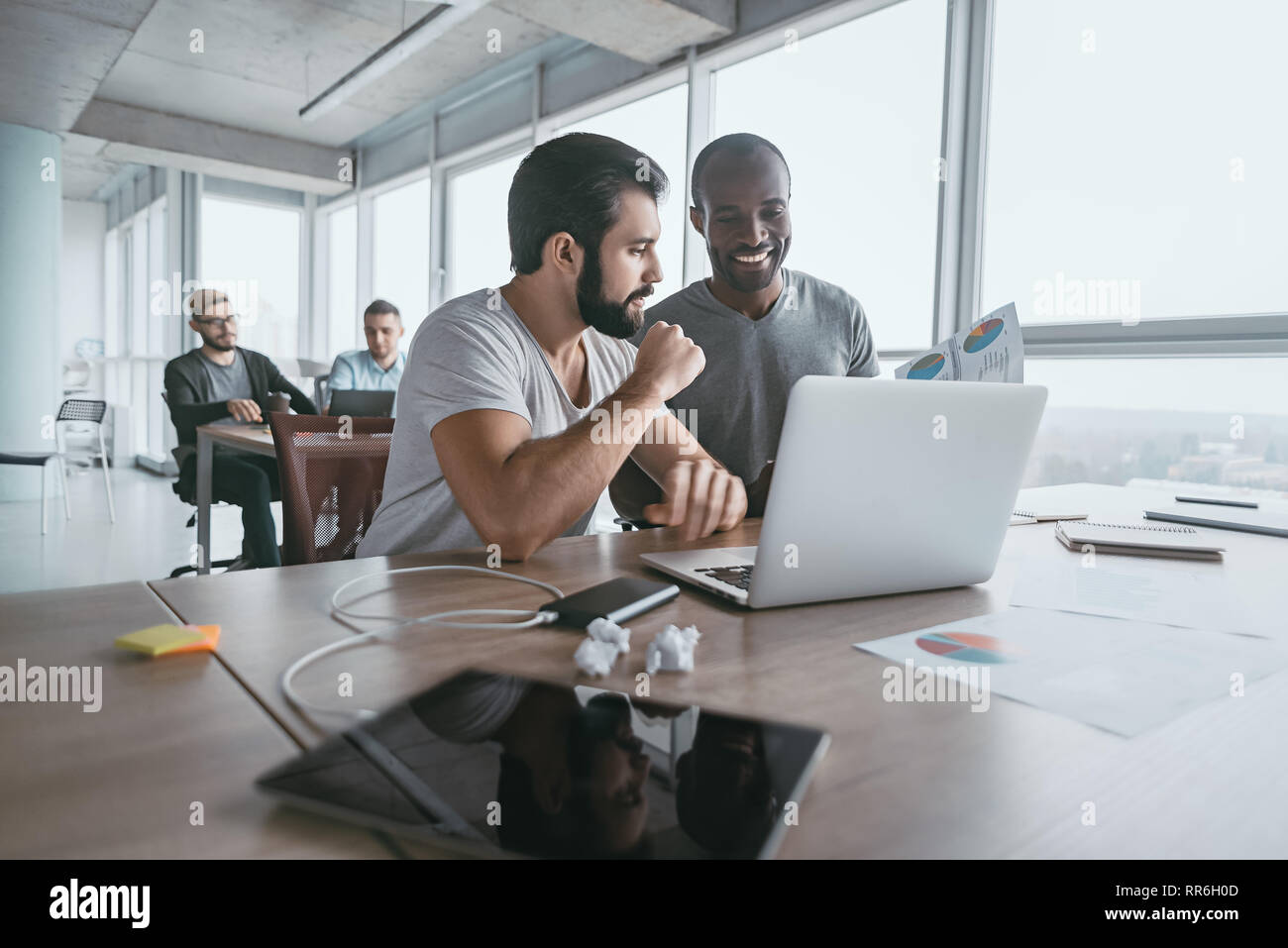 Businessmen having online negotiation hi-res stock photography and ...