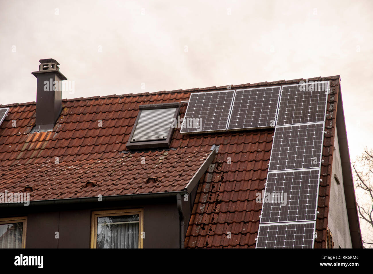 Photovoltaic system on a roof versus chimney heating in bad weather ...
