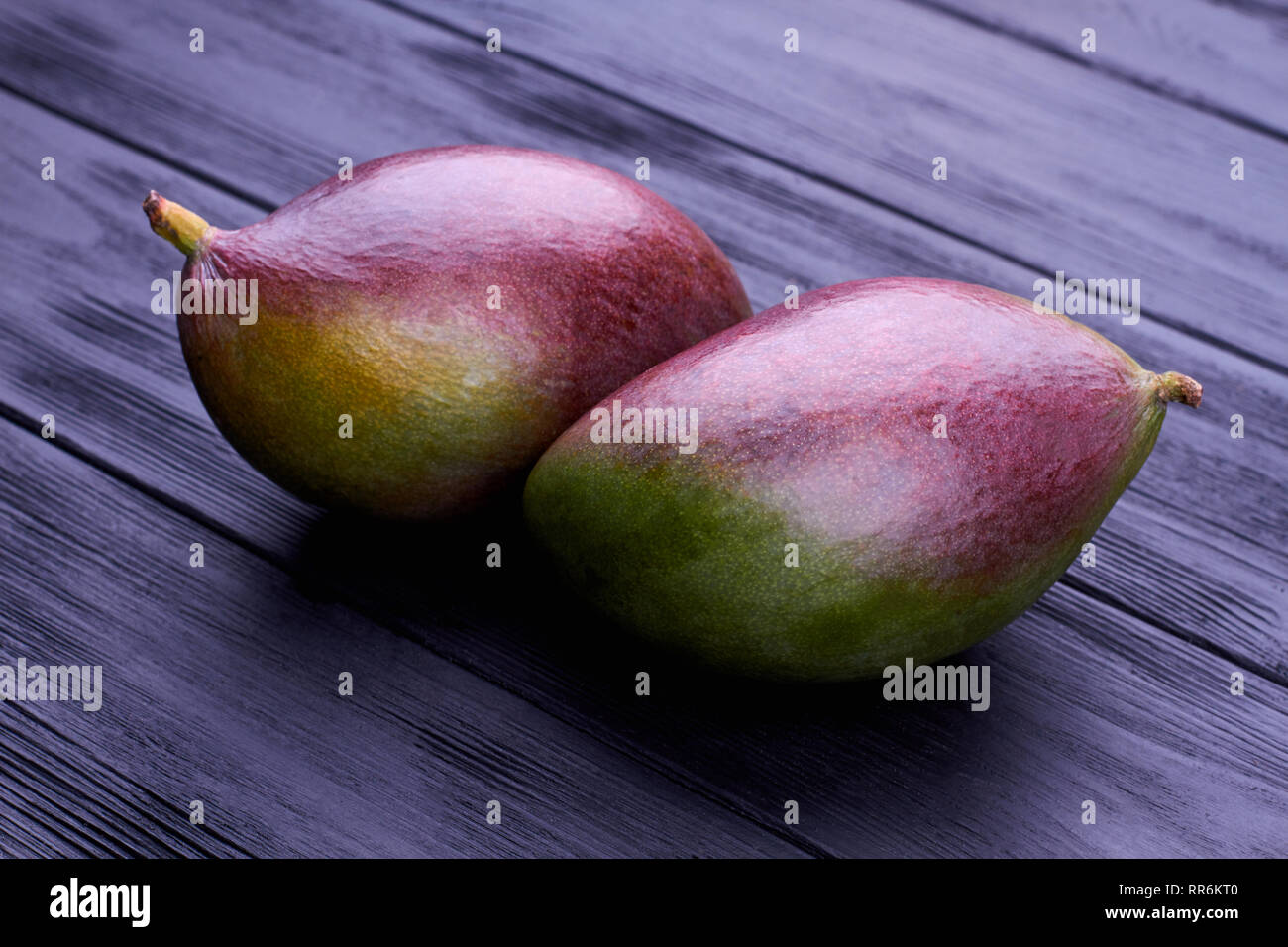 Purple mangoes hi-res stock photography and images - Alamy